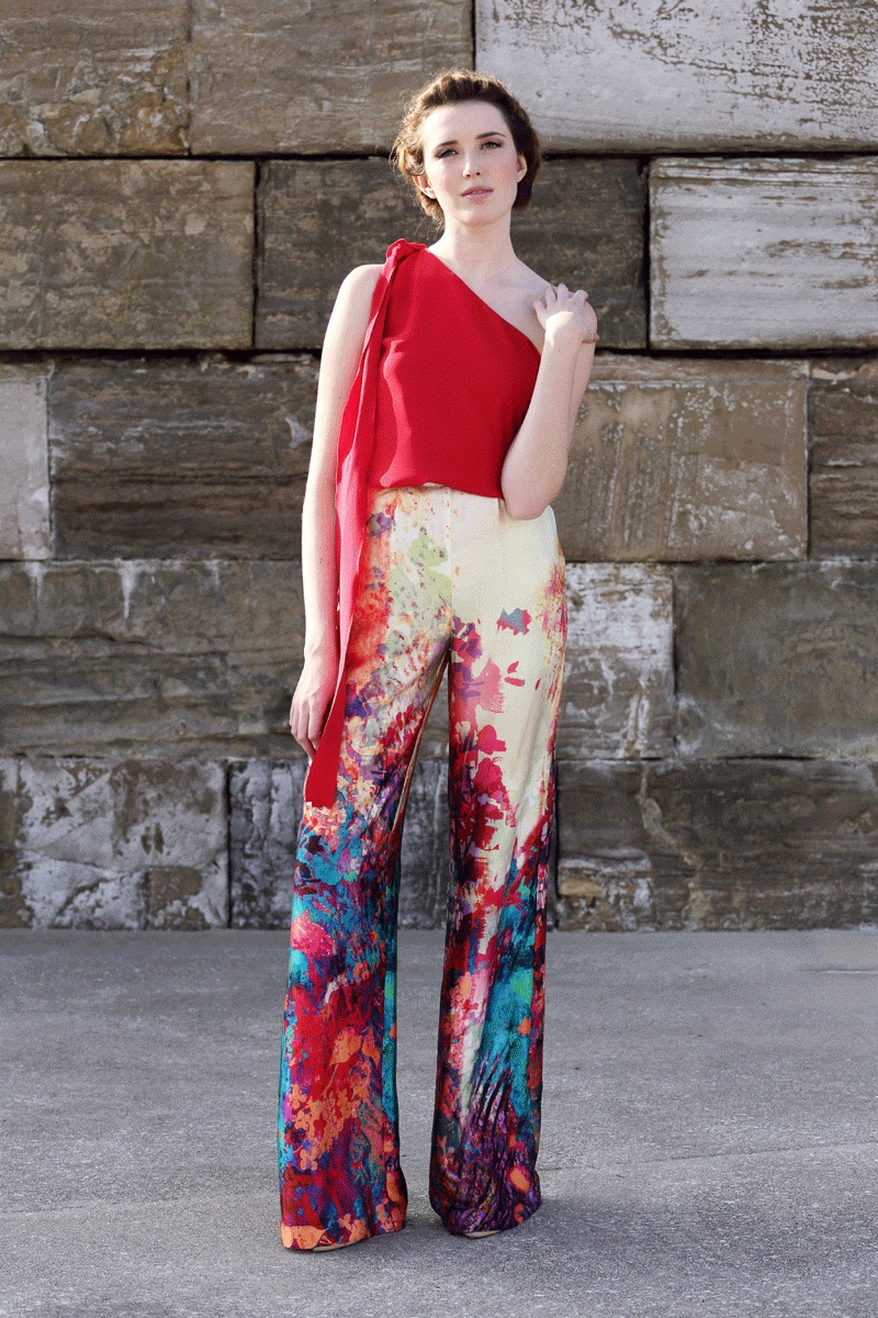 Top de fiesta asimétrico rojo con lazada al hombro